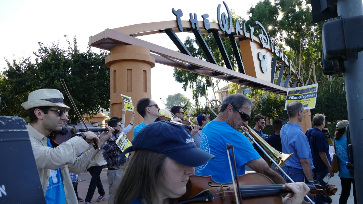 Protesting musicians make peace with studios, for now - Los Angeles Times