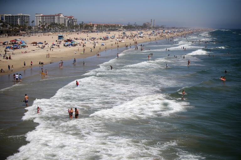 Huntington Beach Coast Guard Investigate Sheen In Ocean Water Near